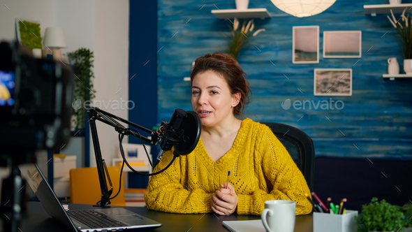 Influencer doing vlog production with professional gear in home studio ...