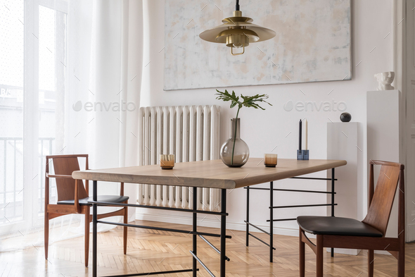 Stylish and modern dining room interior with design sharing table ...