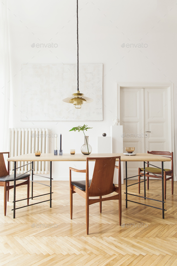 Stylish and modern dining room interior with design sharing table ...