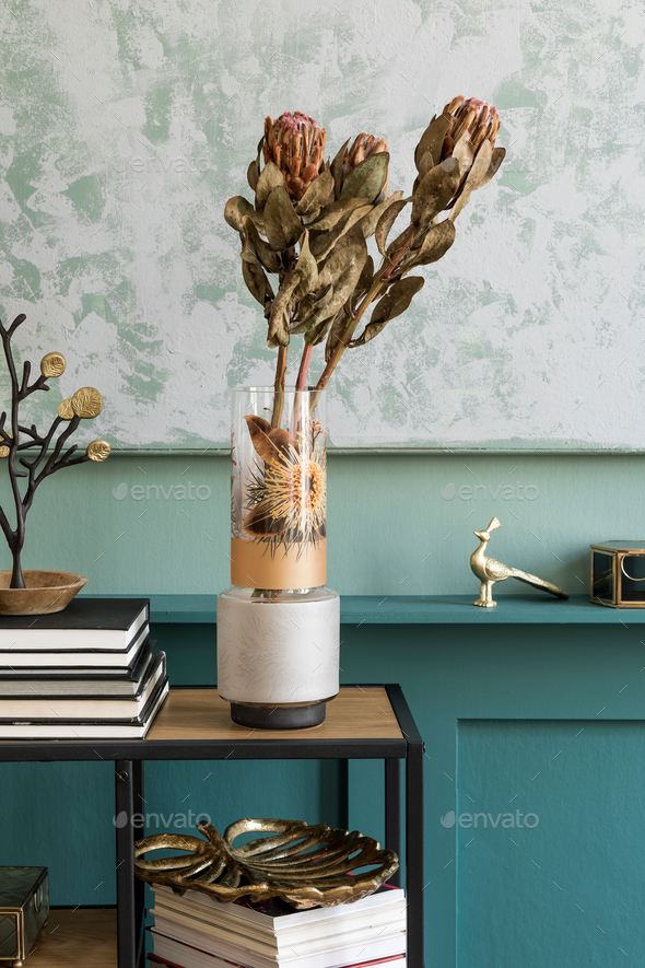 Stylish and floral composition of beautiful flowers in modern vase ...