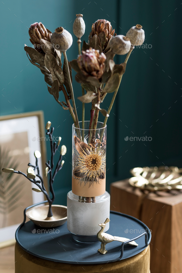 Stylish and floral composition of beautiful flowers in modern vase ...