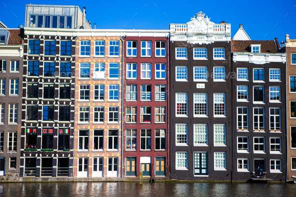Traditional dutch buildings on canal in Amsterdam, Netherlands Stock ...