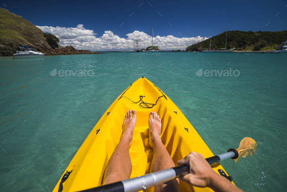 Kayaking in the Bay of Islands, in the Waikare Inlet, while on a boat ...