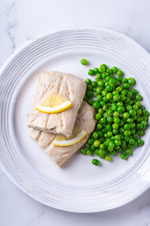 Vegan Plant based fish, fishless fillets with green peas Stock Photo by ...