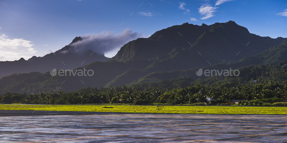 Airport and runway on the tropical island of Rarotonga at sunrise, Cook ...