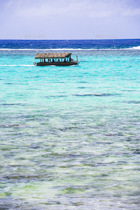 Tourist boat trip on a summer vacation to the tropical island of ...