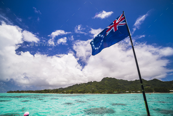 Rarotonga and the Cook Islands flag seen from Muri Lagoon, Rarotonga ...