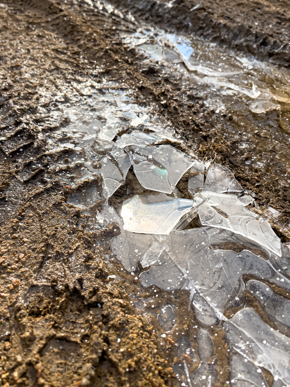 Frozen ground, frost in early winter close up. Stock Photo by puhimec