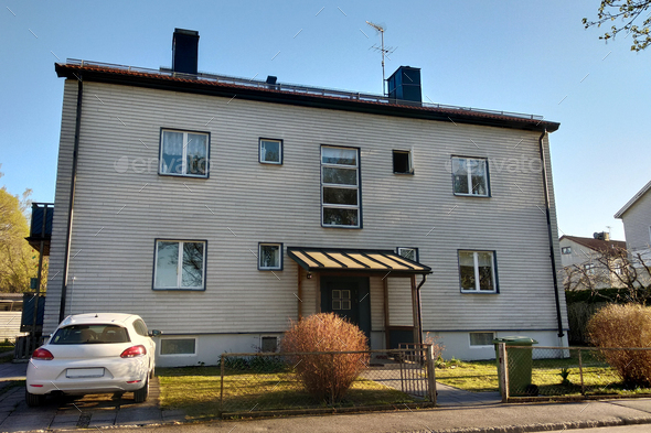 Car parked on a side of the street in quiet rural area of residential ...