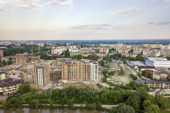 Top view of urban developing city landscape with tall apartment ...