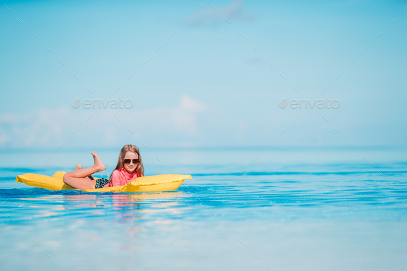 Cute little girl enjoy vacation in the swimming pool Stock Photo by ...