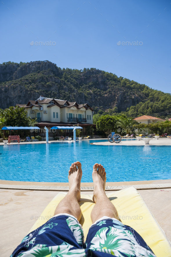 Sunbathing at a swimming pool at a resort in Dalyan, Mugla Province ...