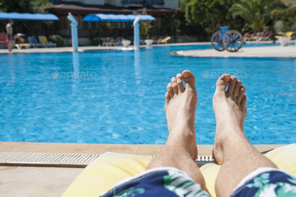 Sunbathing at a swimming pool at a resort in Dalyan, Mugla Province ...