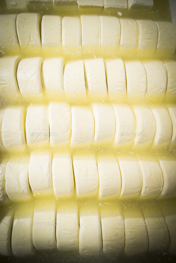 Cheese soaking in salt water at the Cheese Factory on the farm at ...