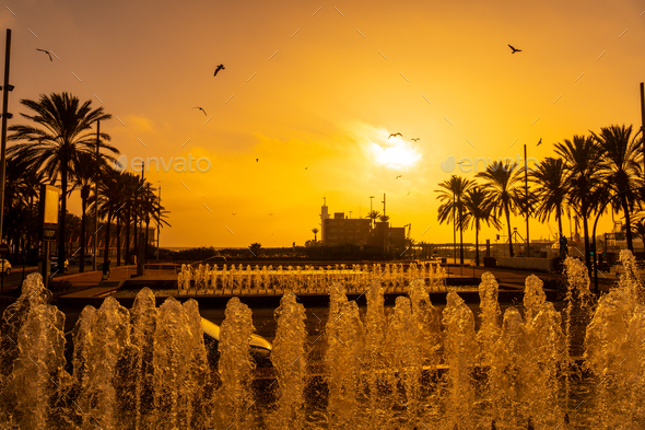 Old loading dock called Cable Frances at orange sunset on the beach in ...