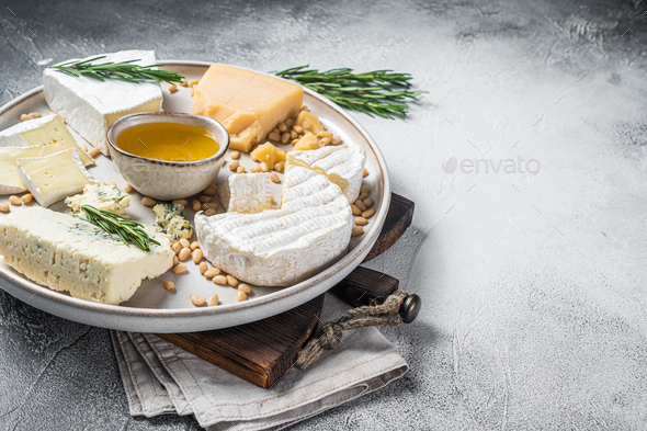 French Cheese platter with camembert, brie, Gorgonzola, parmesan, honey ...