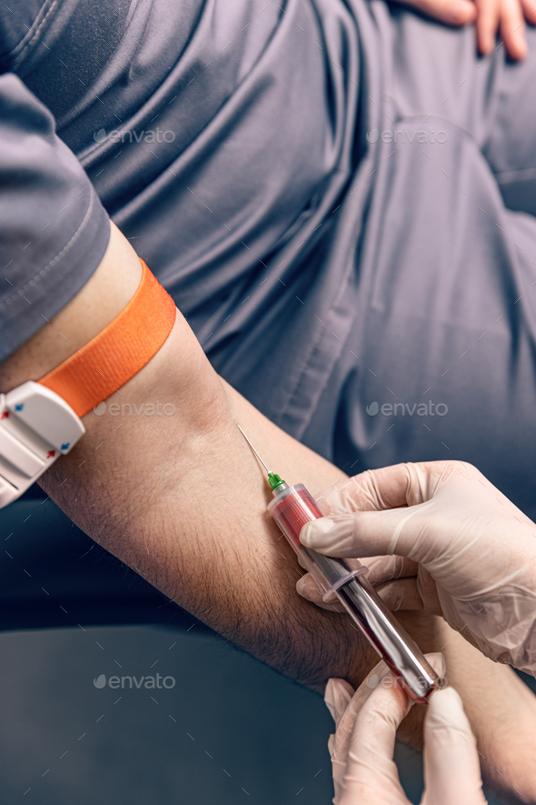 Collecting blood sample Stock Photo by grafvision | PhotoDune
