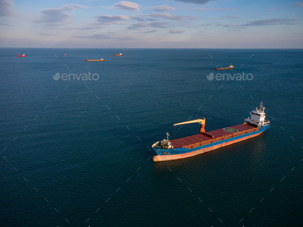 Large general cargo ship, Top down aerial view. Stock Photo by Sandsun