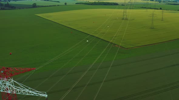 Power Transmission Lines Over Agricultural Field at Farmland, Stock Footage