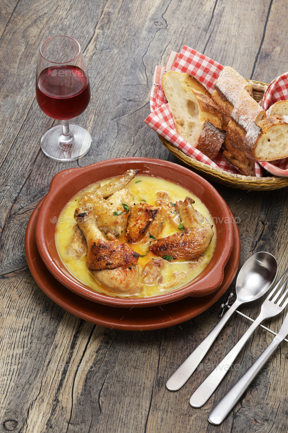 Shkmeruli is a traditional Georgian dish of chicken in garlic milk ...