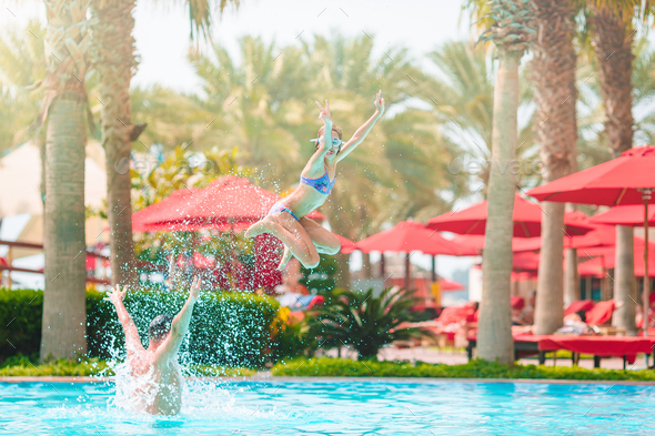 Family of mom and little daughter enjoying summer vacation in luxury ...