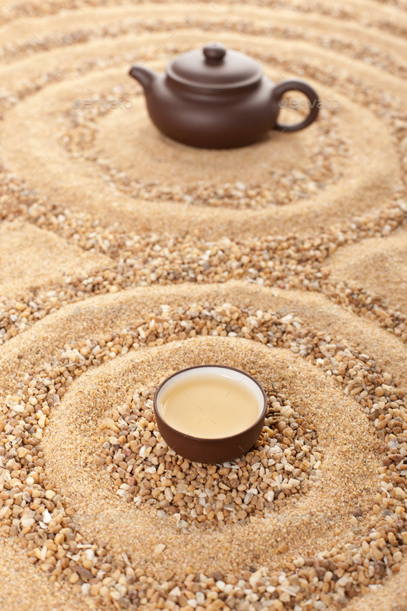 Tea set in sand Stock Photo by bluejeanimages | PhotoDune