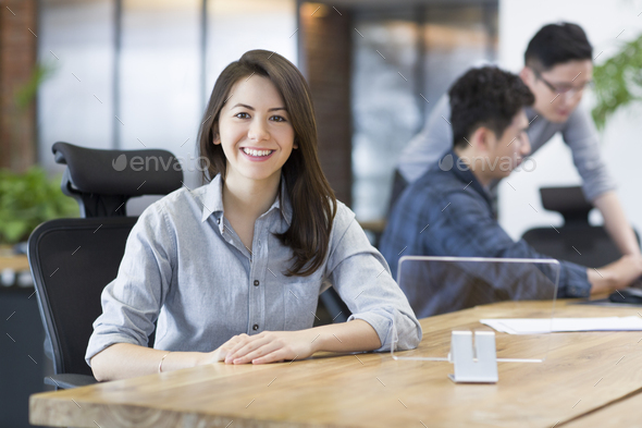 IT workers developing digital tablet Stock Photo by bluejeanimages