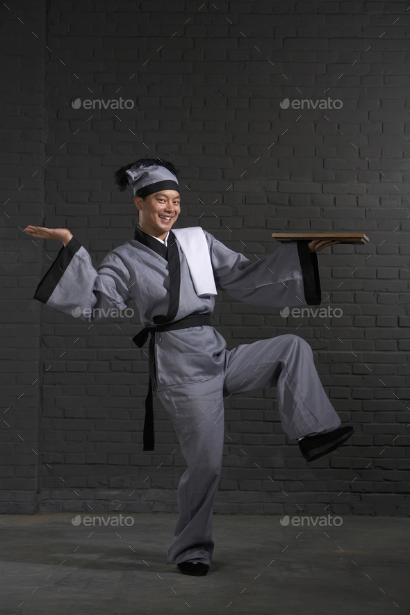 Traditional Chinese waiter Stock Photo by bluejeanimages | PhotoDune