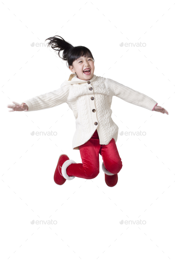 Cute Chinese girl jumping Stock Photo by bluejeanimages | PhotoDune
