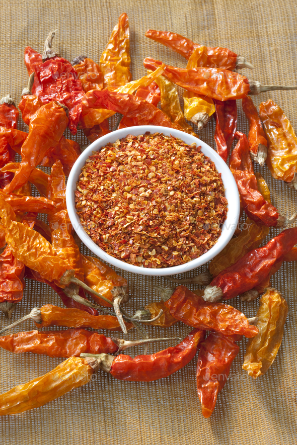 Dry Chili Pepper and red chilli powder Stock Photo by bluejeanimages