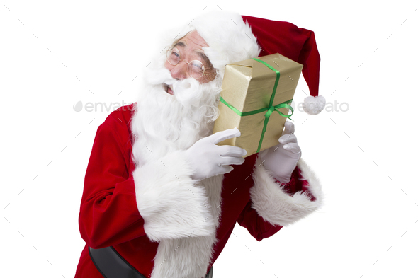 Santa Claus with Christmas gift Stock Photo by bluejeanimages | PhotoDune