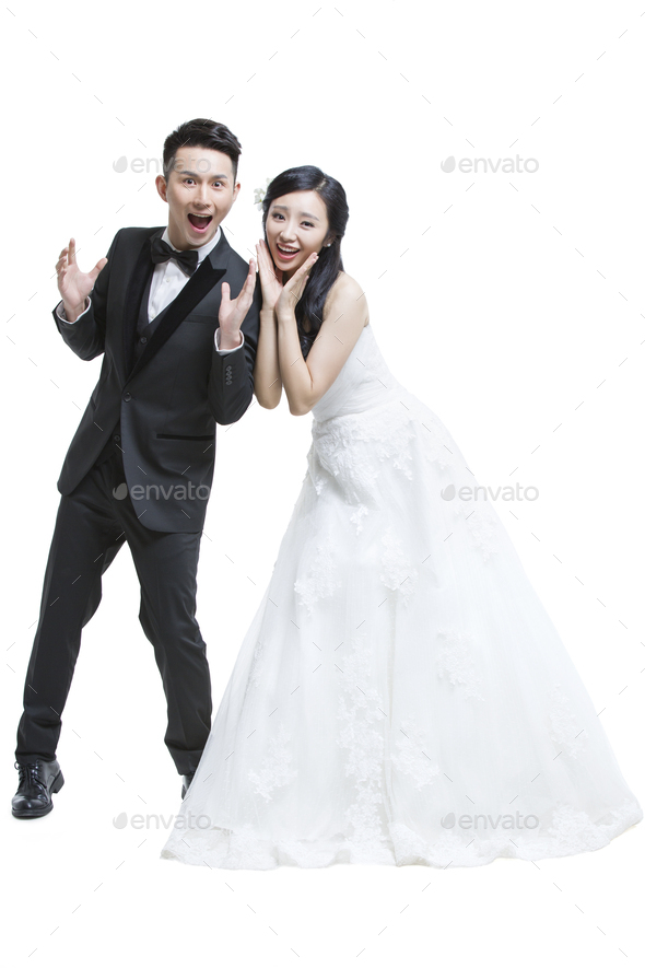 Shocked bride and groom Stock Photo by bluejeanimages | PhotoDune