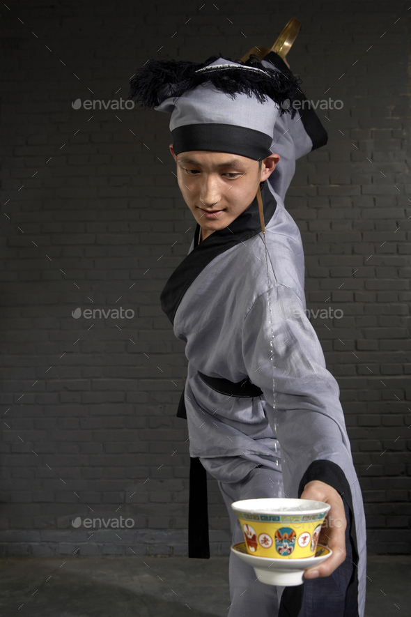Traditional Chinese waiter Stock Photo by bluejeanimages | PhotoDune