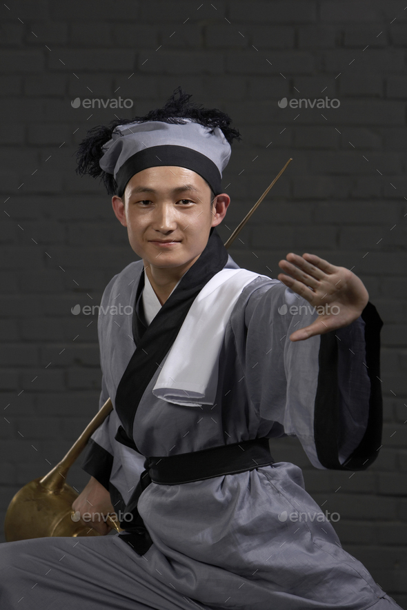 Traditional Chinese waiter Stock Photo by bluejeanimages | PhotoDune