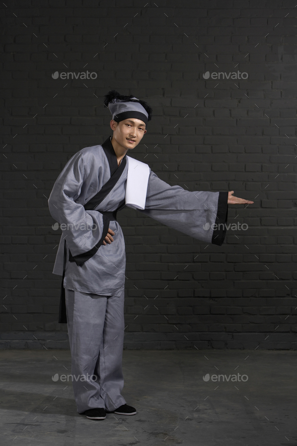 Traditional Chinese waiter Stock Photo by bluejeanimages | PhotoDune