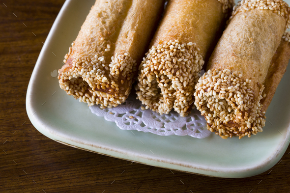 Traditional Chinese dim sum mashed taro roll Stock Photo by bluejeanimages