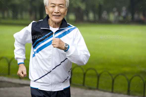 Senior Man Running in a Park Stock Photo by bluejeanimages | PhotoDune