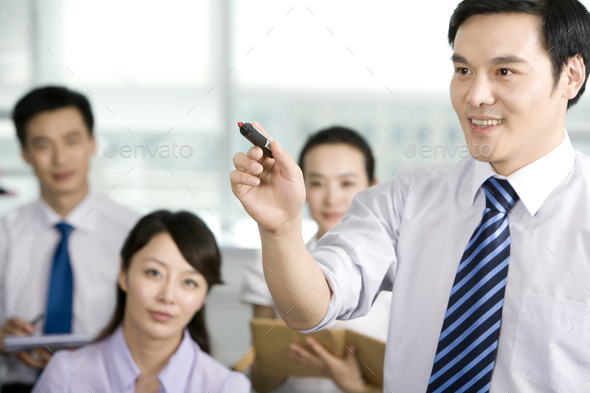 Meeting at the office Stock Photo by bluejeanimages | PhotoDune