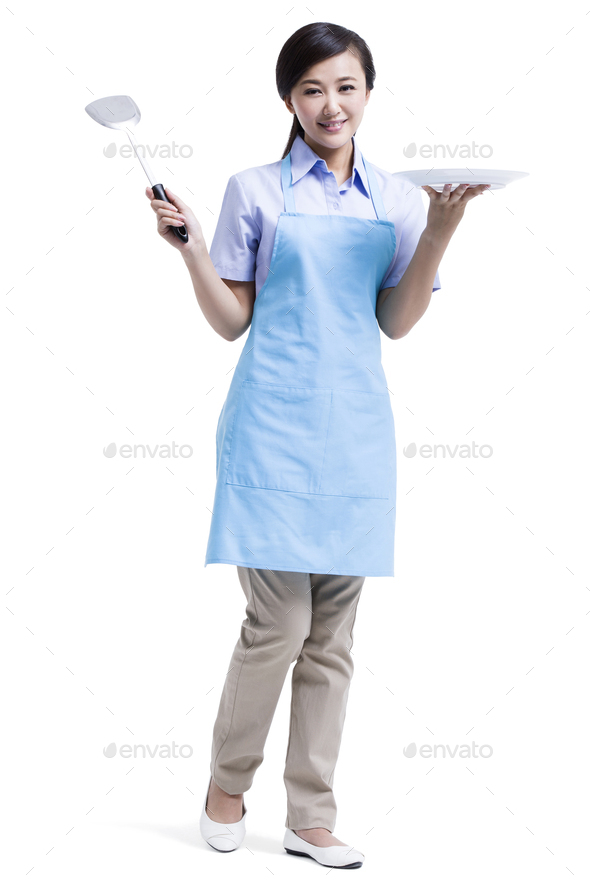 Domestic servant cooking Stock Photo by bluejeanimages | PhotoDune