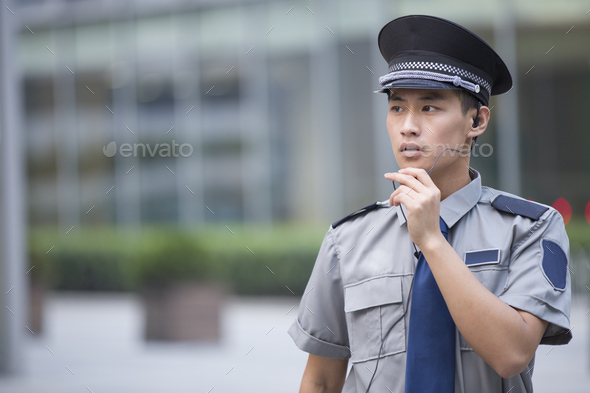 Security staff Stock Photo by bluejeanimages | PhotoDune