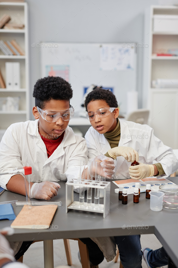 Kids in Science Laboratory Stock Photo by seventyfourimages | PhotoDune
