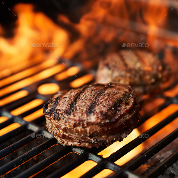 flaming hot grill cooking bacon wrapped filet mignon Stock Photo by ...