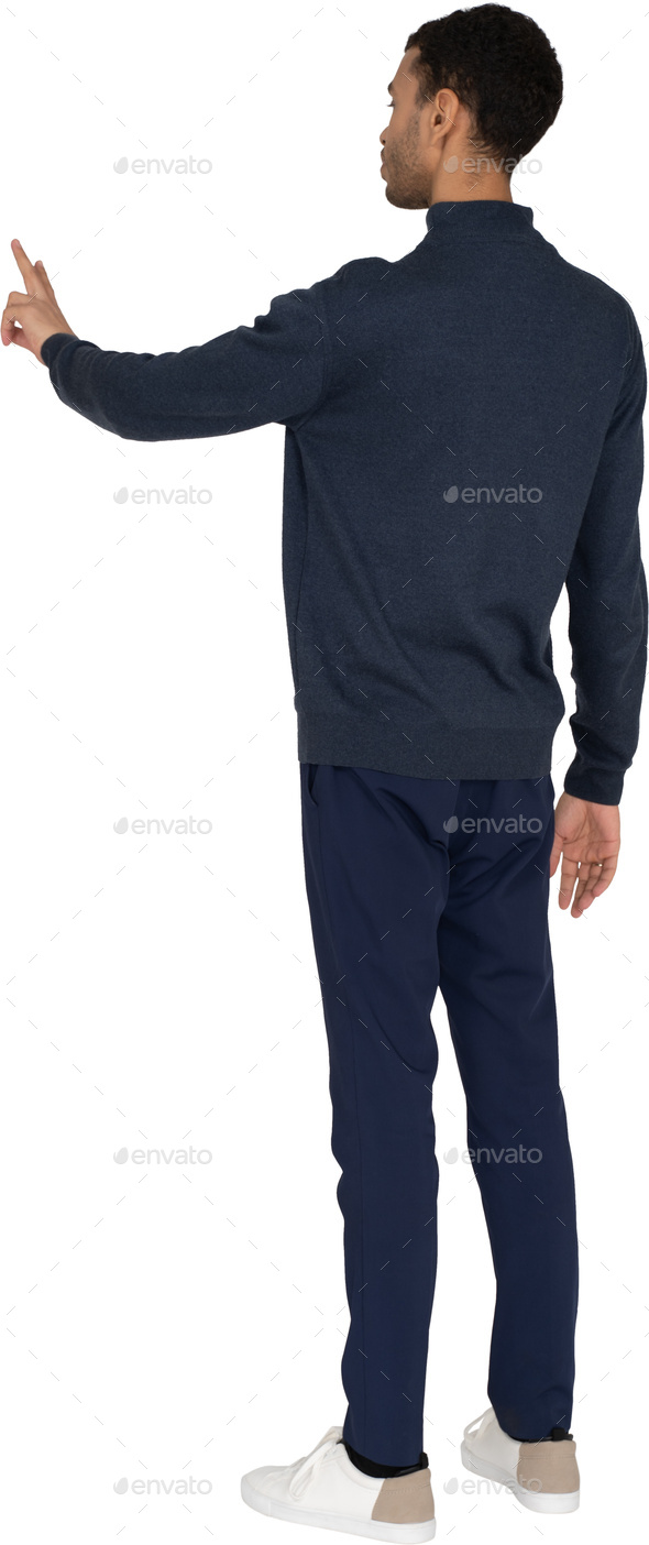 a man is standing with his arm outstretched and holding his hand out to ...