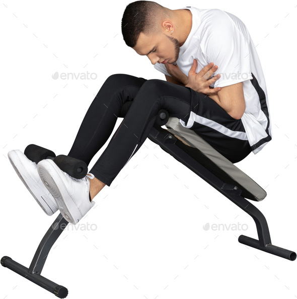 a man sitting on a chair with his hand on his chest Stock Photo by Icons8