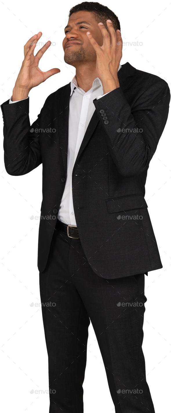 a man in a suit holding his hands up to his face Stock Photo by Icons8