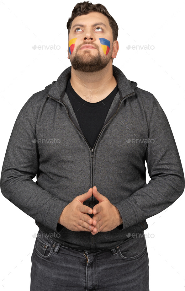 a man with his face painted with a pride flag Stock Photo by Icons8