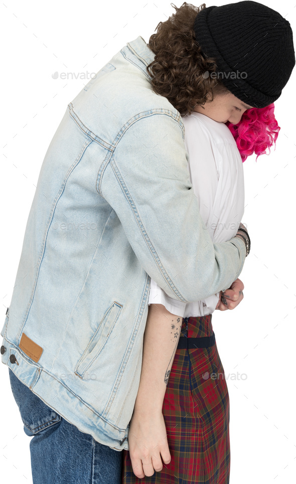 a woman is hugging a man in a denim jacket Stock Photo by Icons8 ...