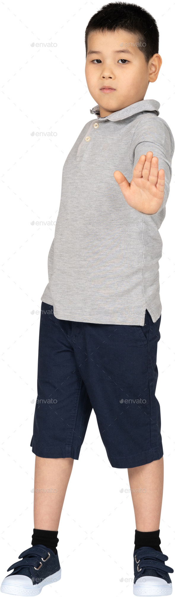 a young boy is posing for a picture with his hand out Stock Photo by Icons8