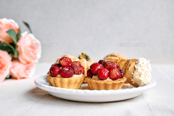 Delicious tartlets dessert assorted pastries. Mini tartlets with cream ...