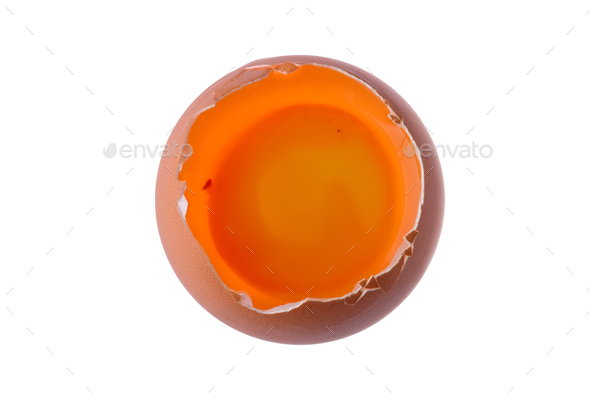 Closeup overhead view of chicken egg without shell on top. Yolk and ...